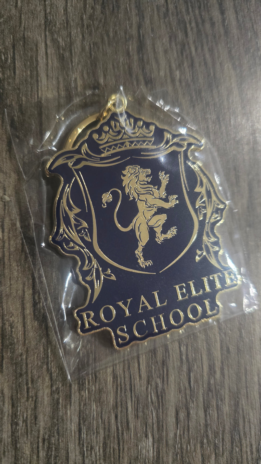 Rina Kent - Royal Elite School Logo Keychain – The Book Spice